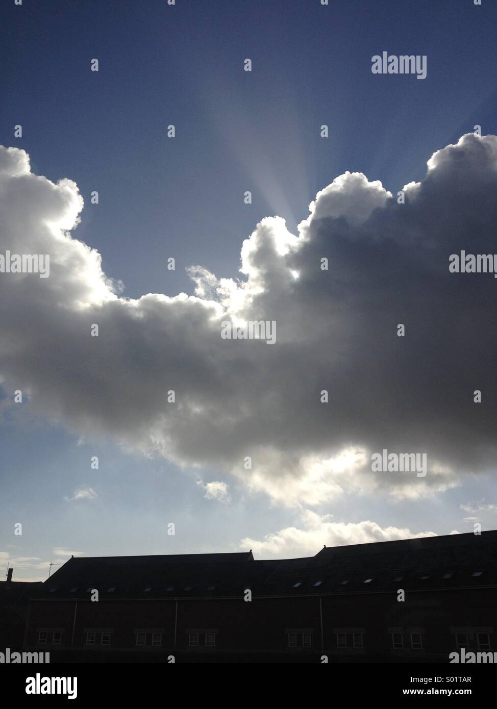 Sun behind a cloud hi-res stock photography and images - Alamy