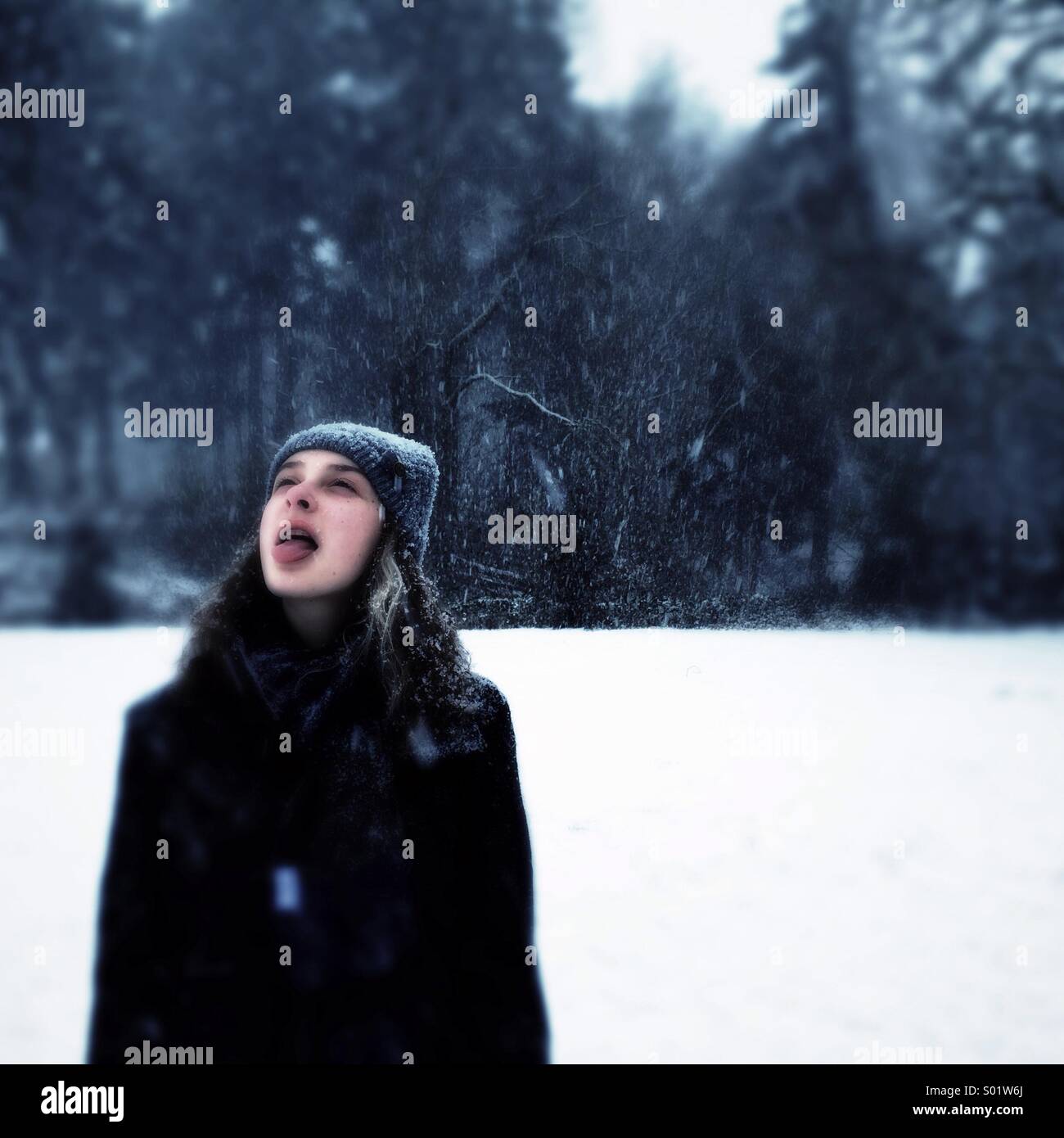 Girl Catching Snowflakes Tongue High Resolution Stock Photography and ...