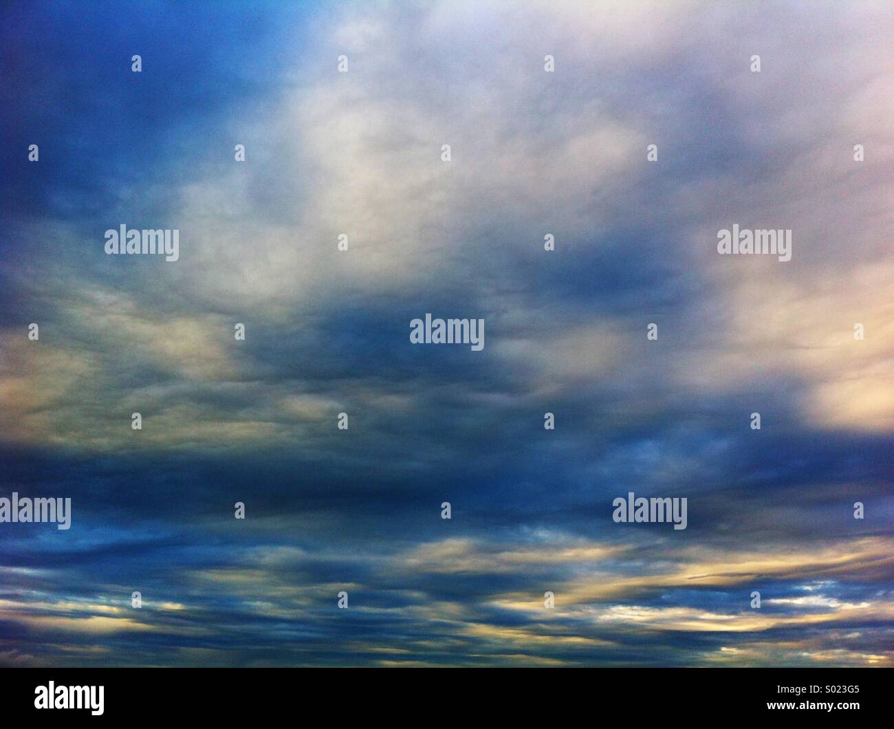 Vivid blue cloudy sky Stock Photo - Alamy