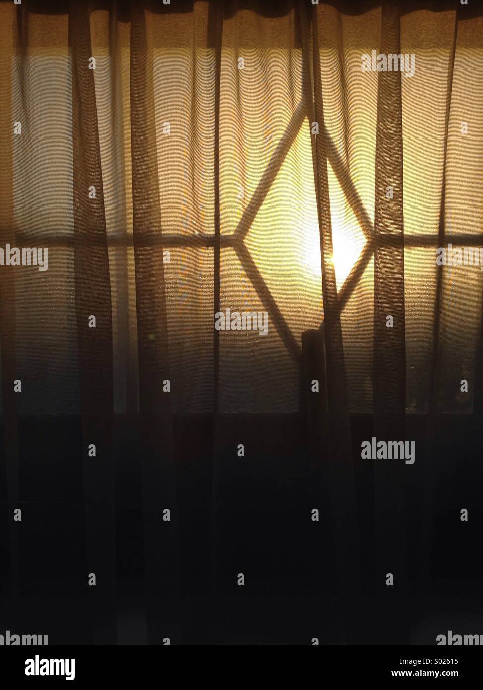 Morning sun through bedroom window Stock Photo - Alamy