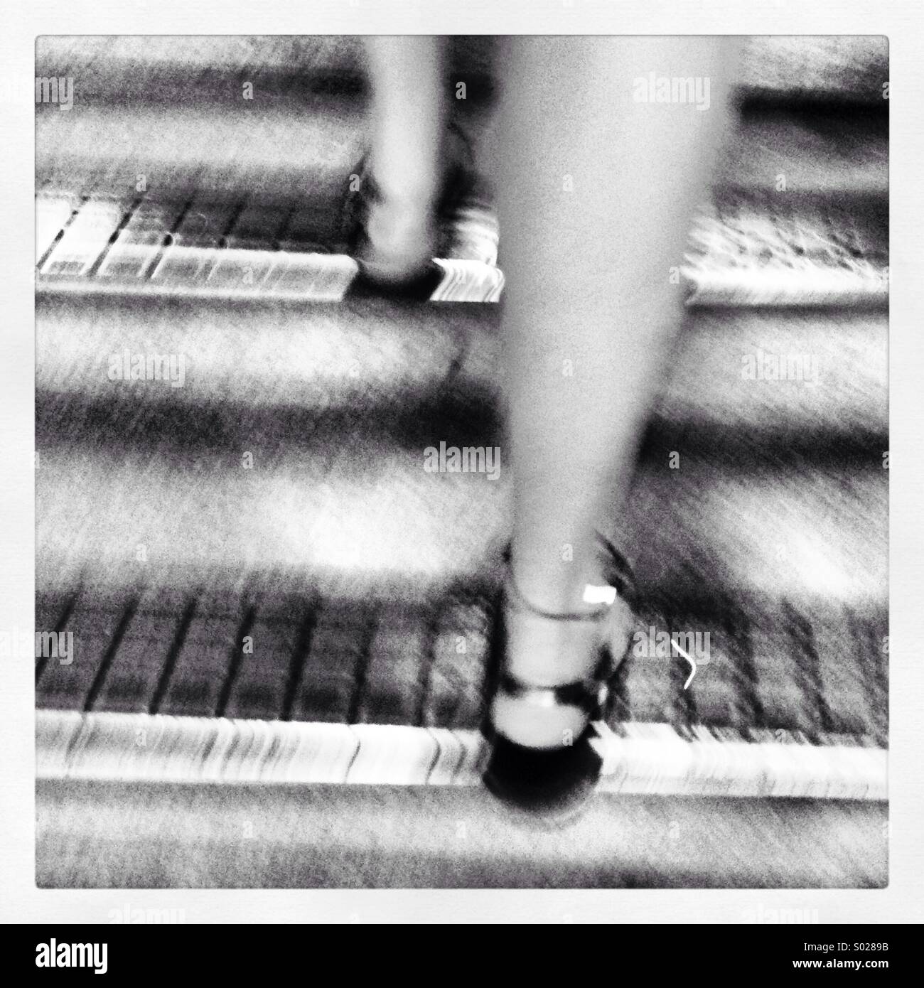 Feet going up some steps on the London Underground Stock Photo - Alamy
