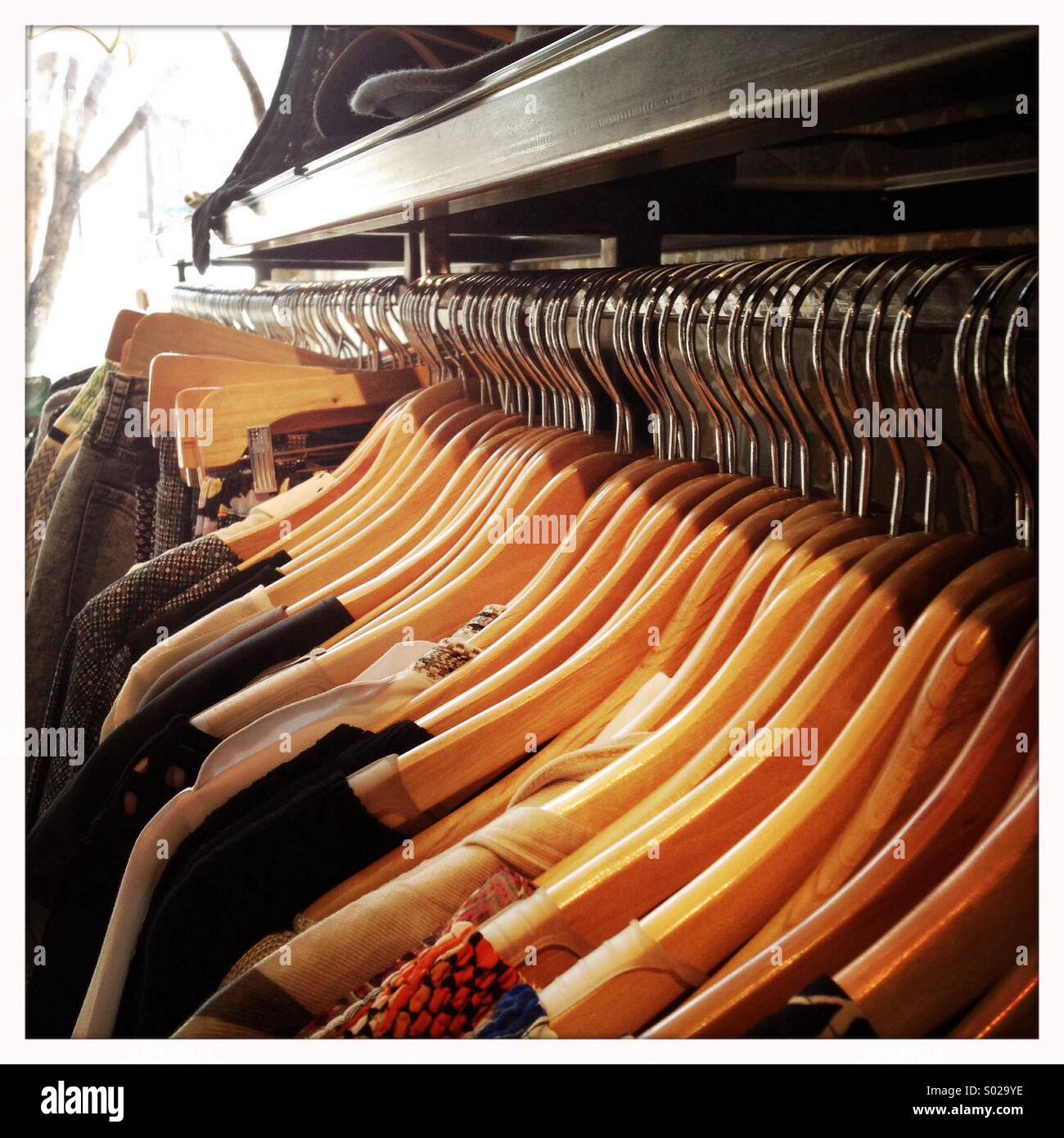 Clothing on Hangers Stock Photo - Alamy