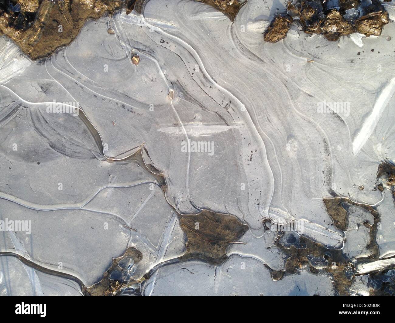Iced puddle patterns hi-res stock photography and images - Alamy