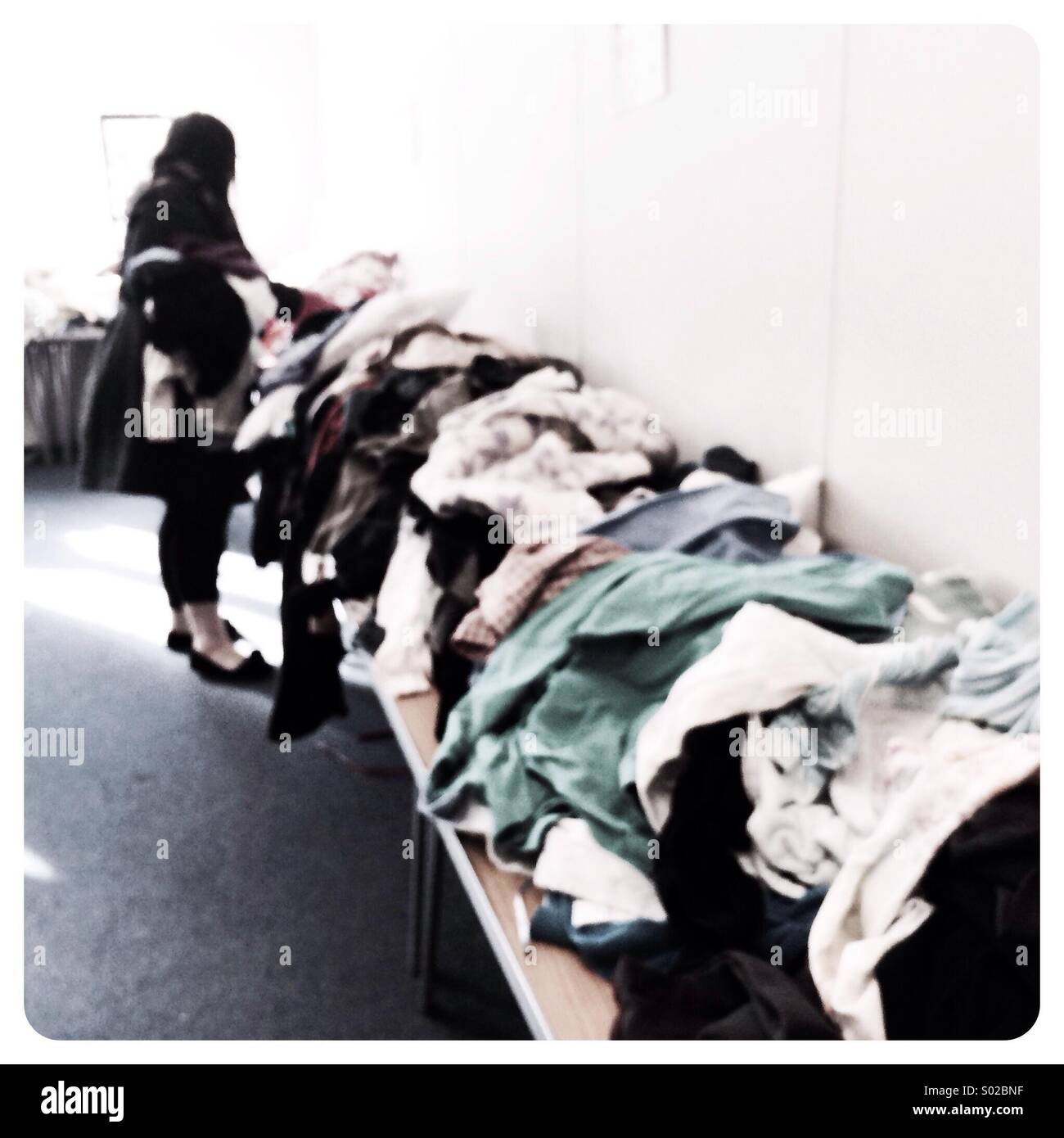 Jumble sale clothes hi-res stock photography and images - Alamy