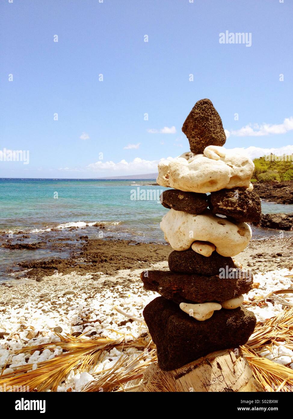 Stacked Rocks at Holoholokai Beach Park, Hawaii Stock Photo - Alamy