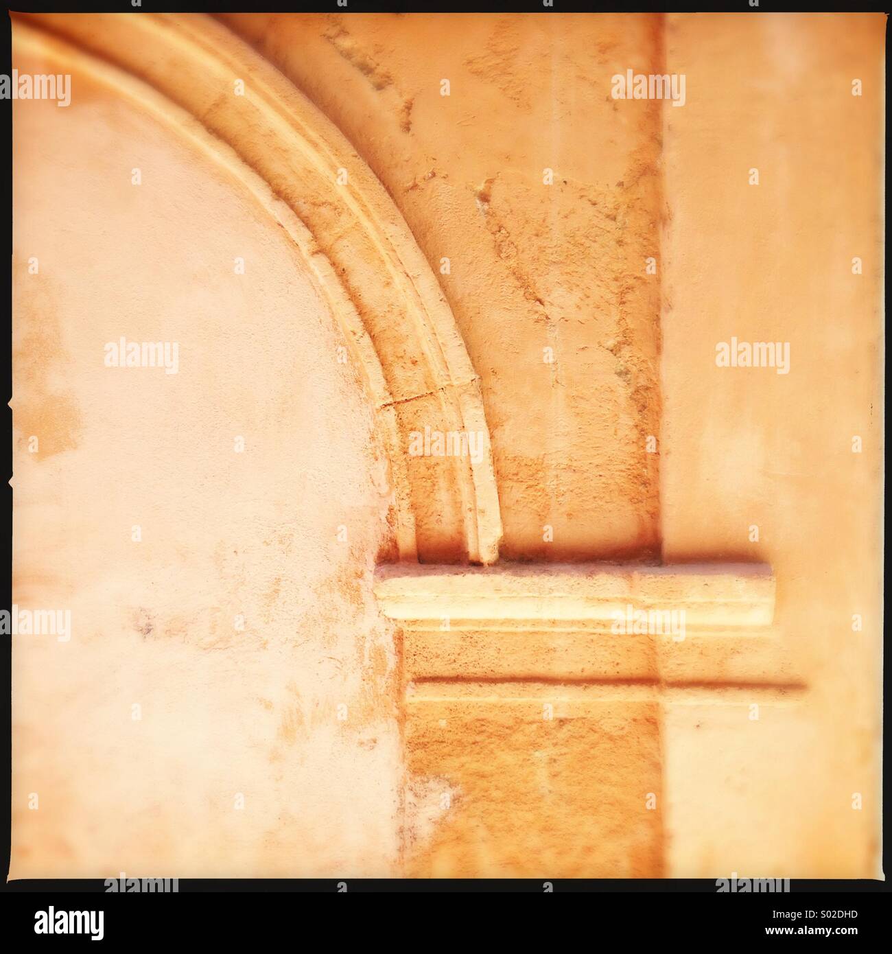 Stone arch on wall Stock Photo - Alamy