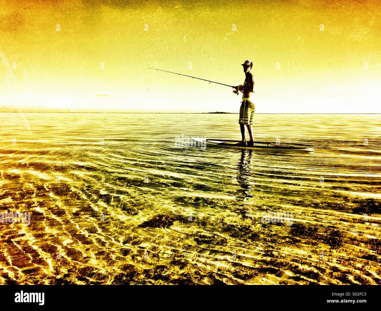 Sup fishing hi-res stock photography and images - Alamy