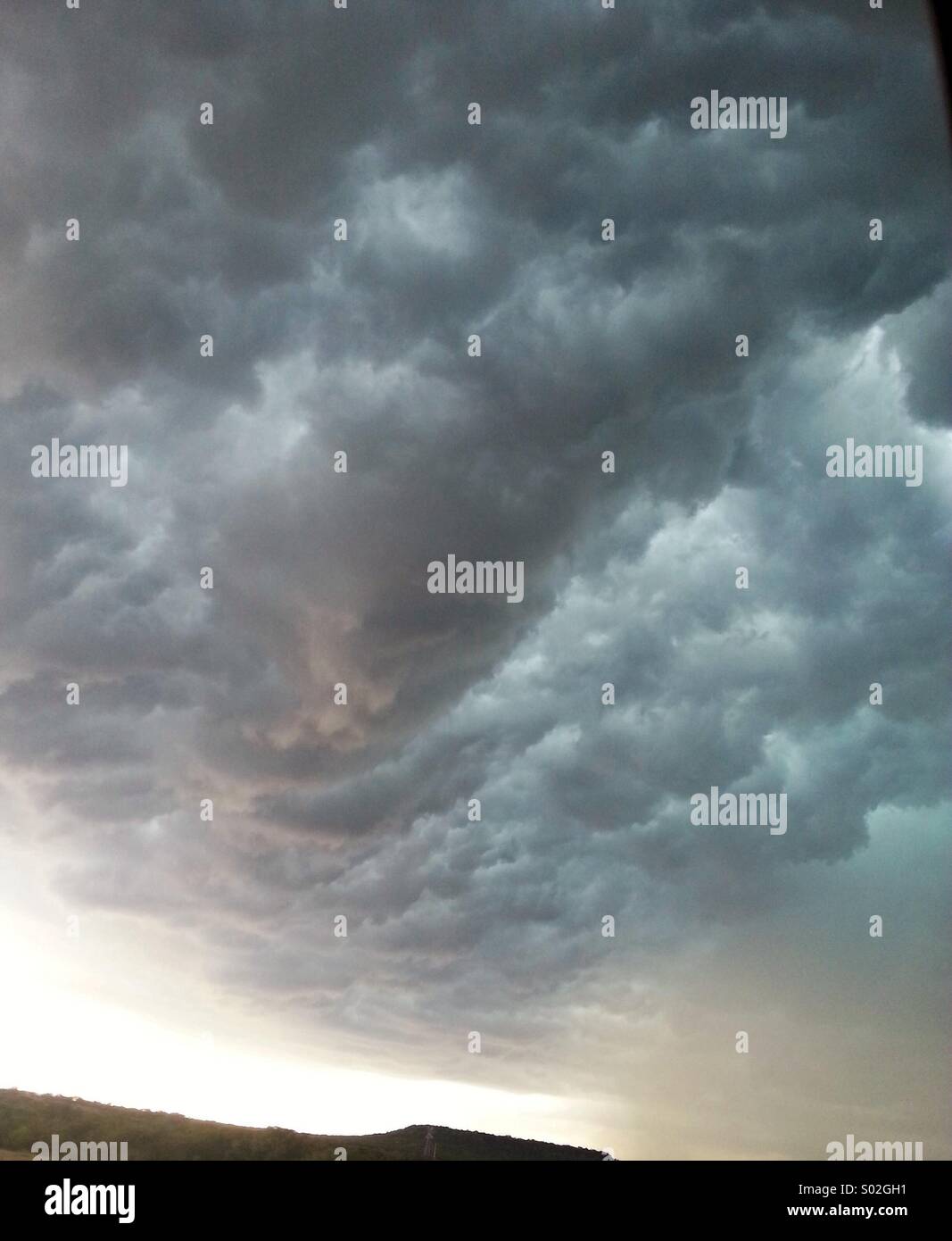 Rolling storm clouds wind hi-res stock photography and images - Alamy