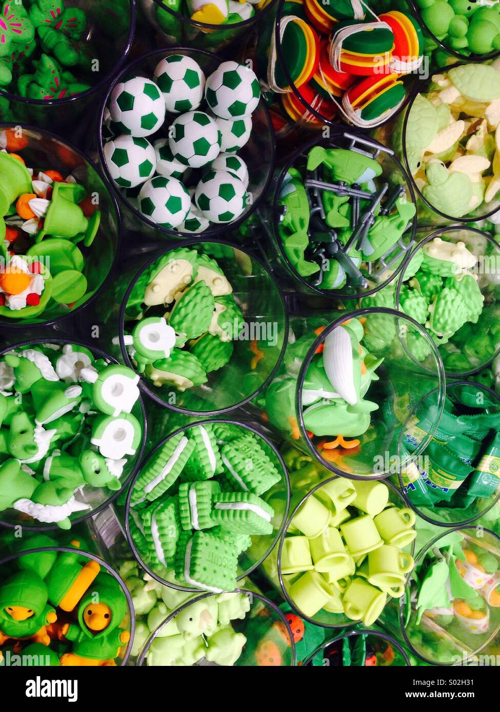 Green colored rubbers mix Stock Photo - Alamy