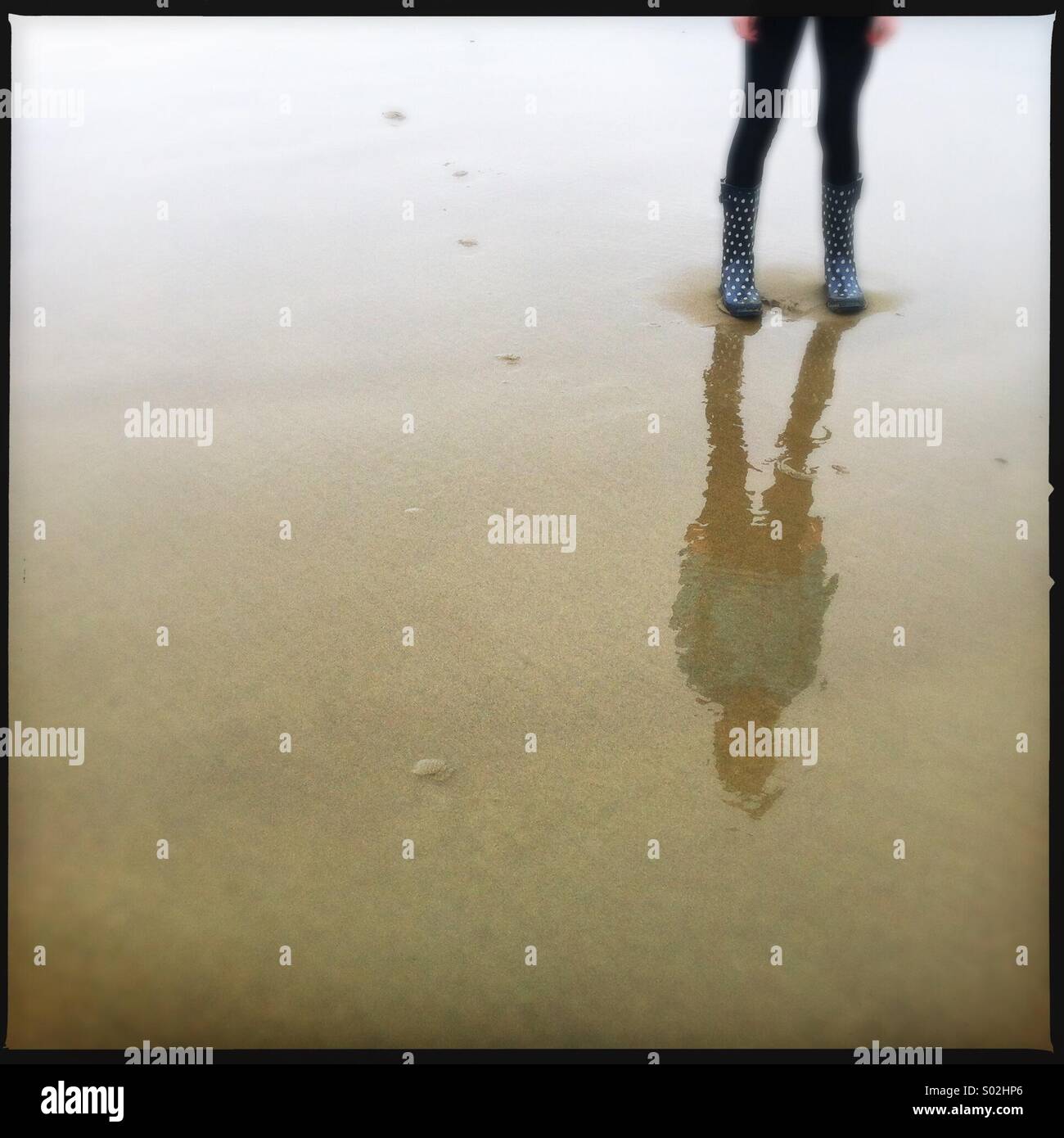 Reflection of person on beach hi-res stock photography and images - Alamy