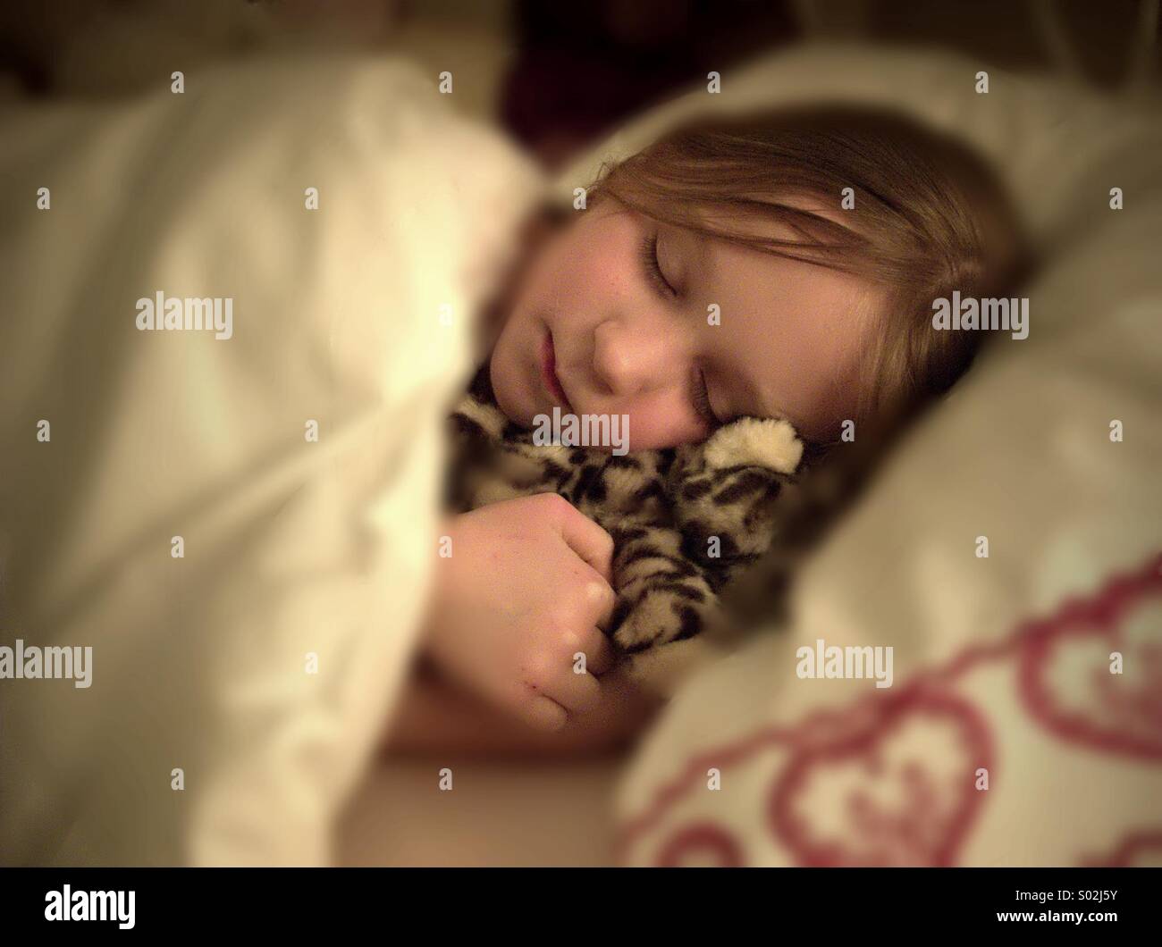 Little girl in dreamy sleep Stock Photo - Alamy