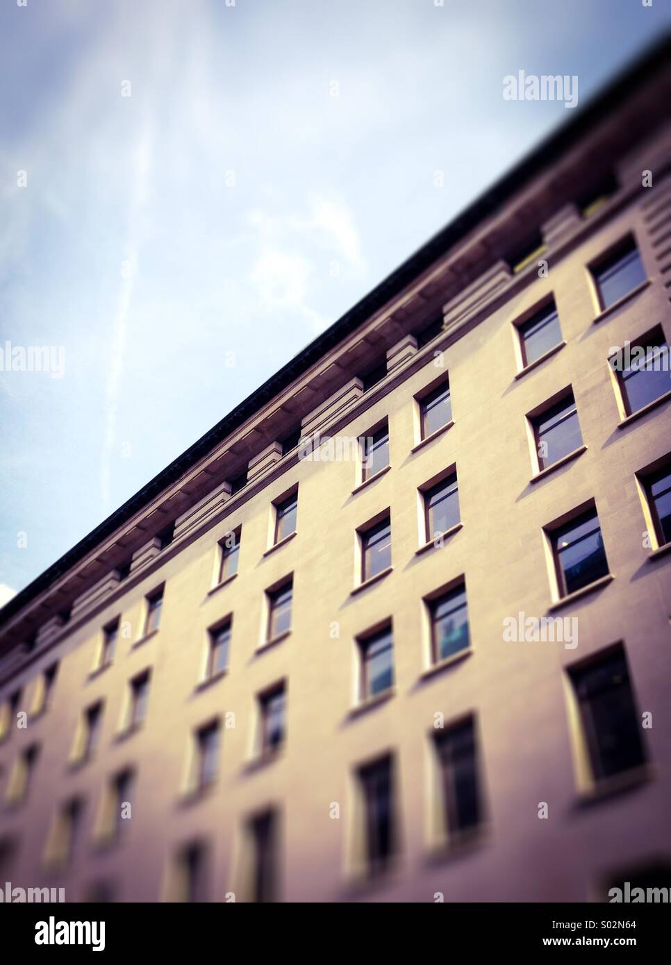 Side of building with lots of windows Stock Photo - Alamy