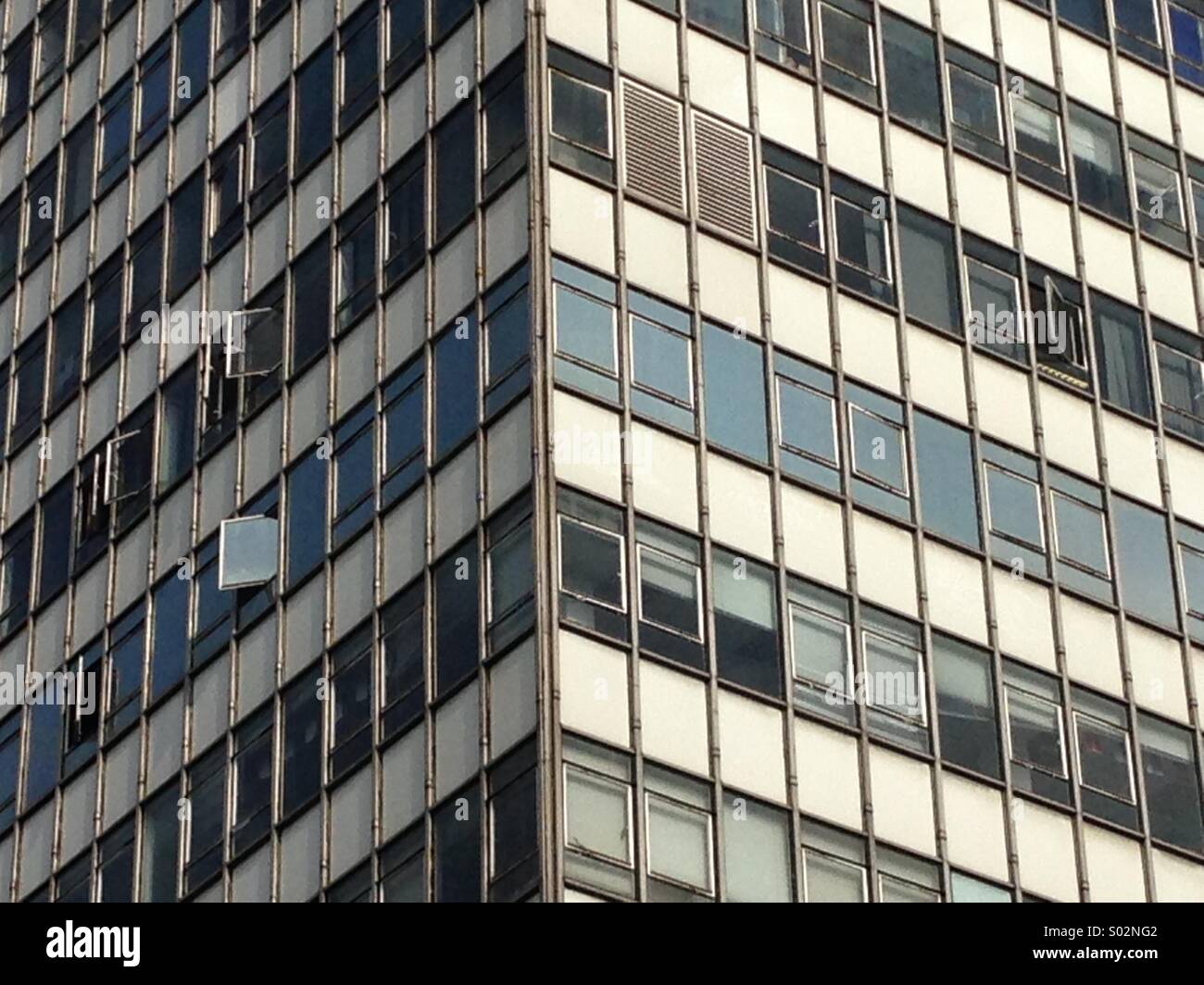 Office windows on tower block Stock Photo - Alamy