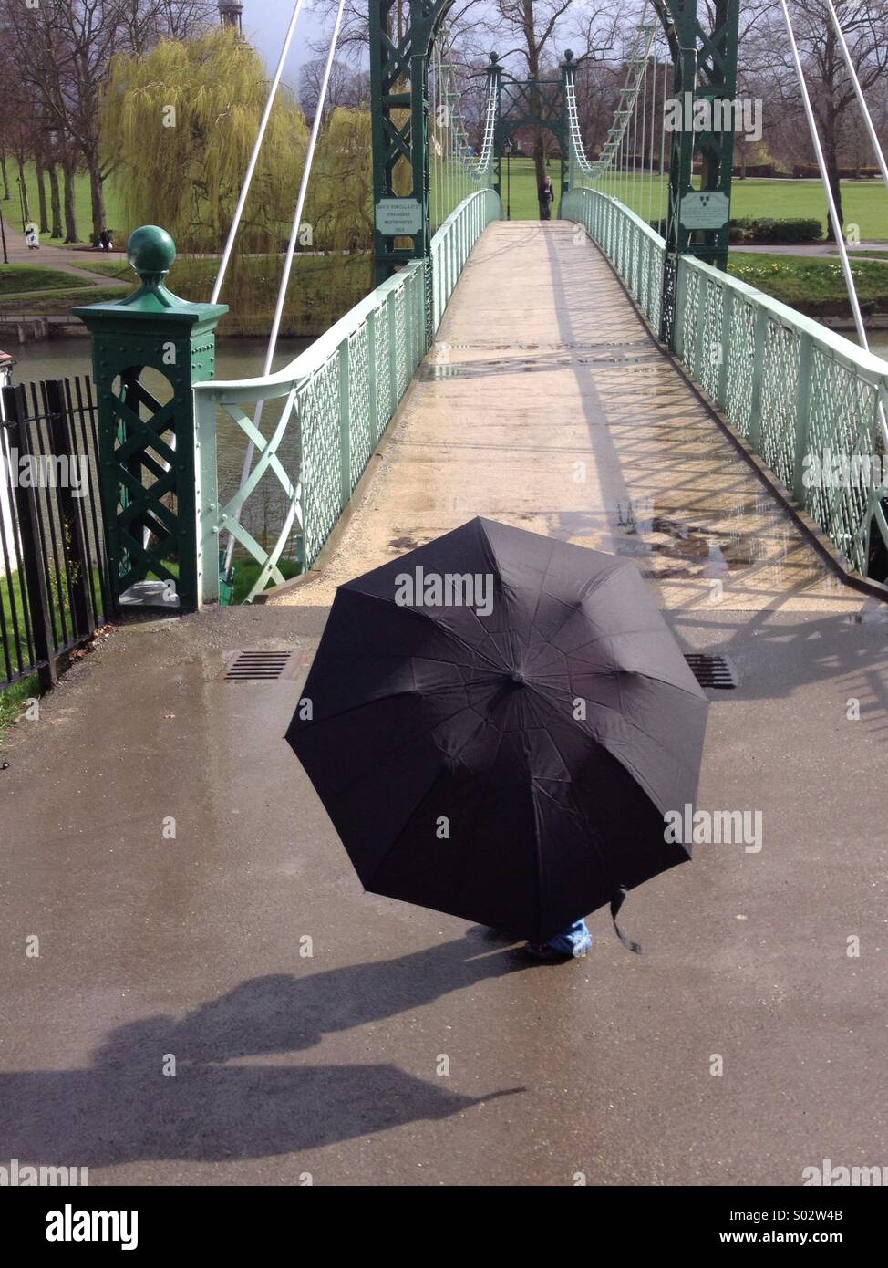 Carrying an umbrella hi-res stock photography and images - Alamy