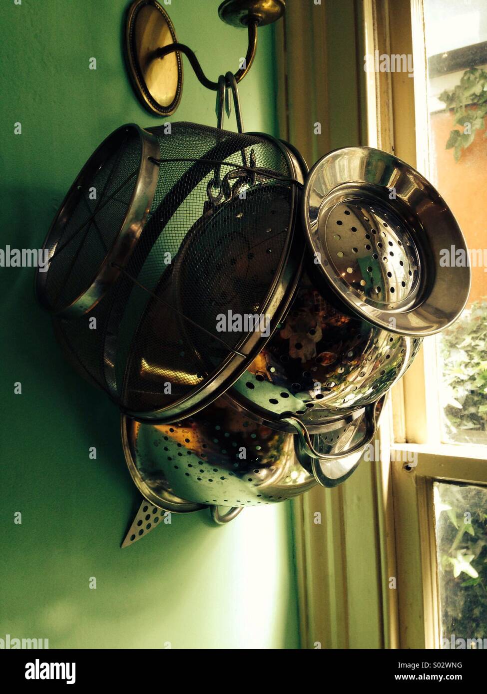 Hanging utensils hi-res stock photography and images - Alamy