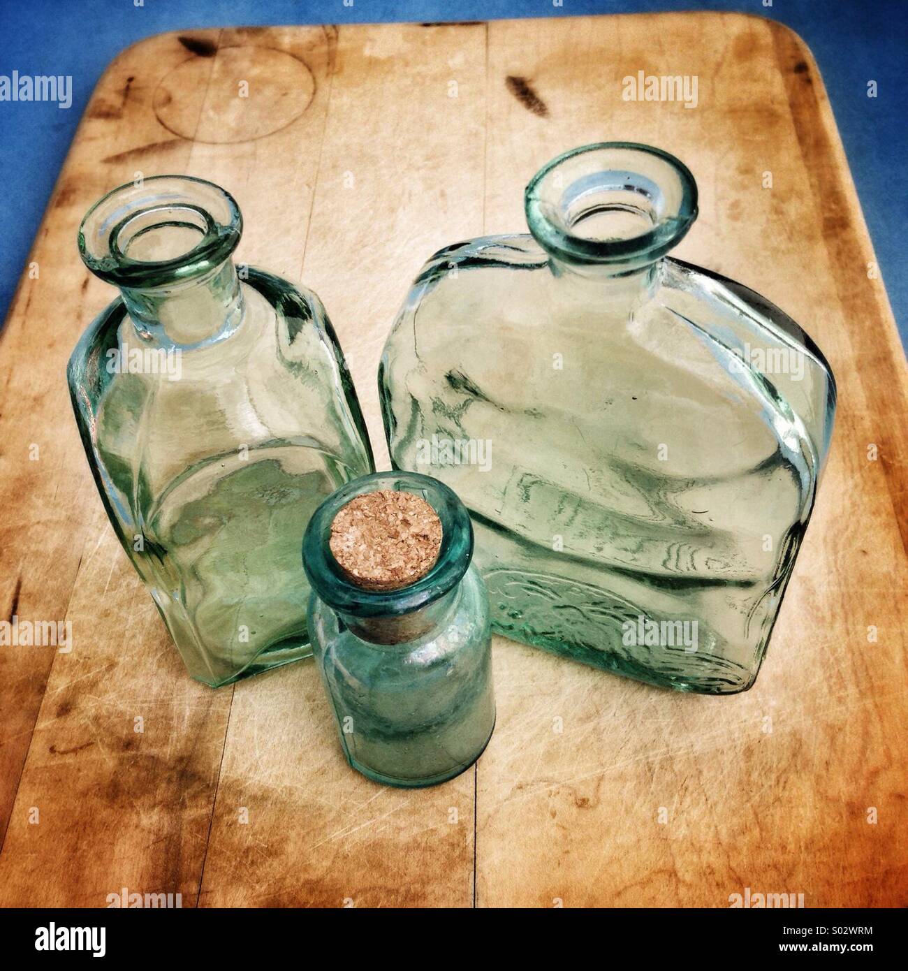 Vintage green glass bottles hi-res stock photography and images - Alamy