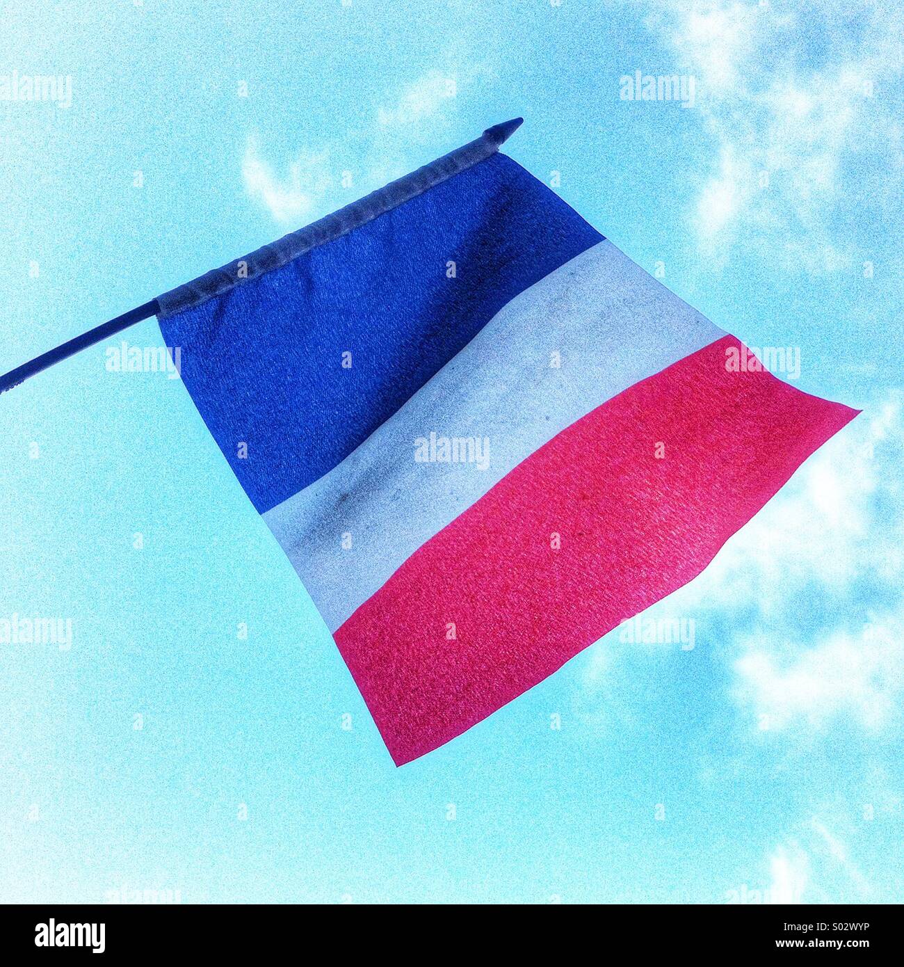 French flag with a blue sky Stock Photo - Alamy