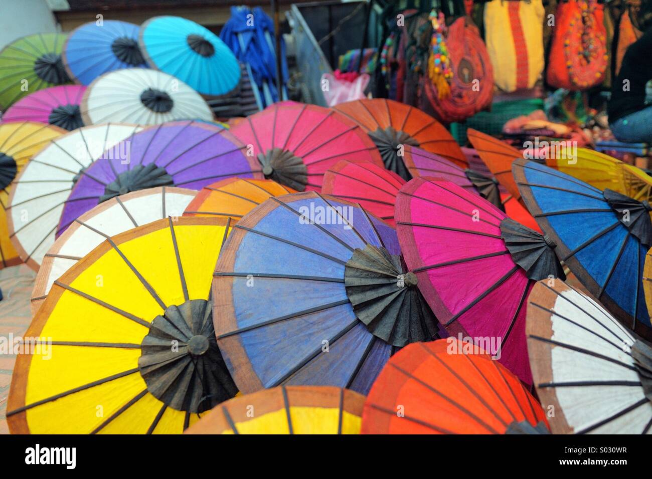 Red yellow blue green umbrella hi-res stock photography and images - Alamy