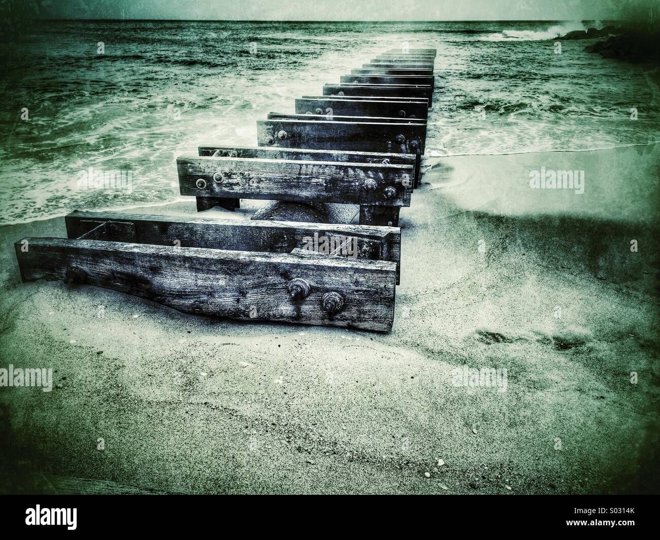 Pier on beach Stock Photo - Alamy