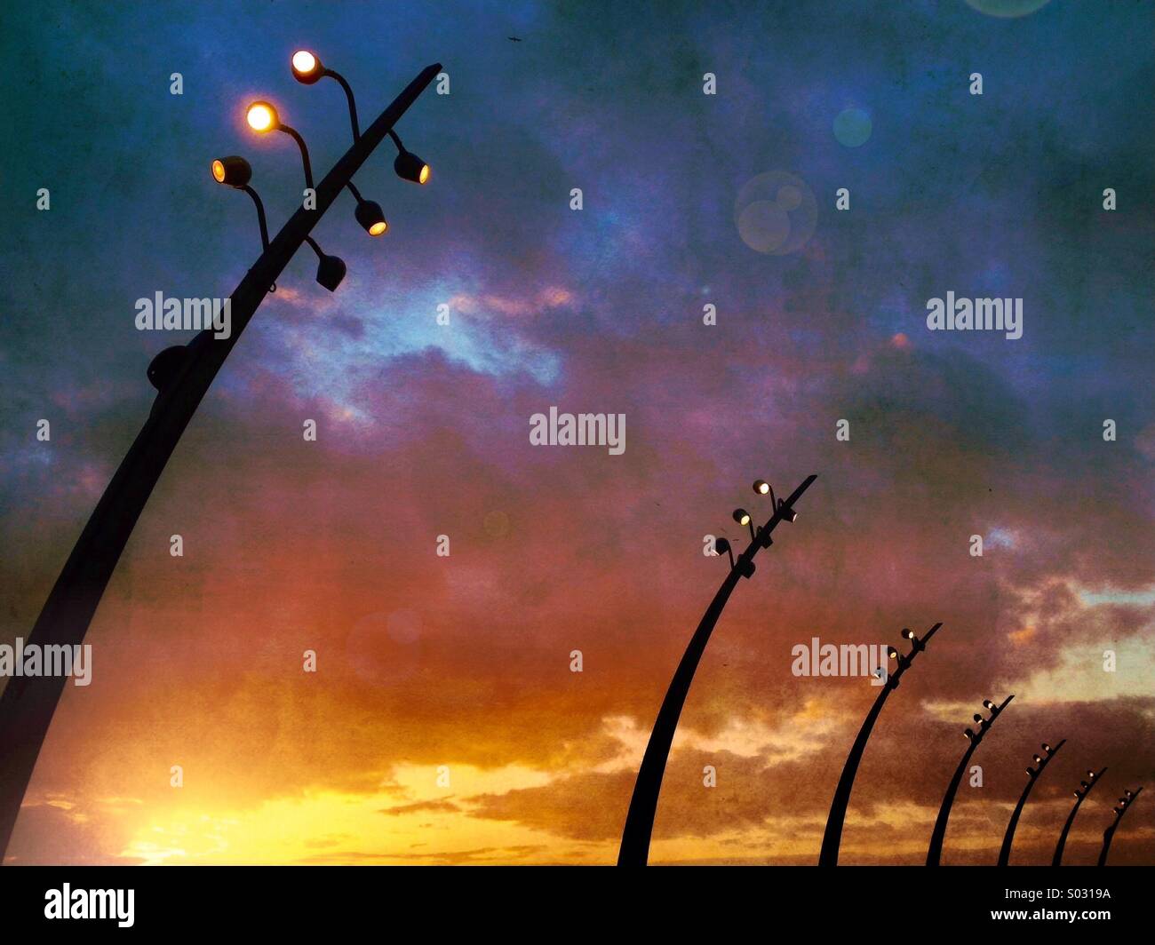 Lights on Blackpool prom at sunset Stock Photo - Alamy