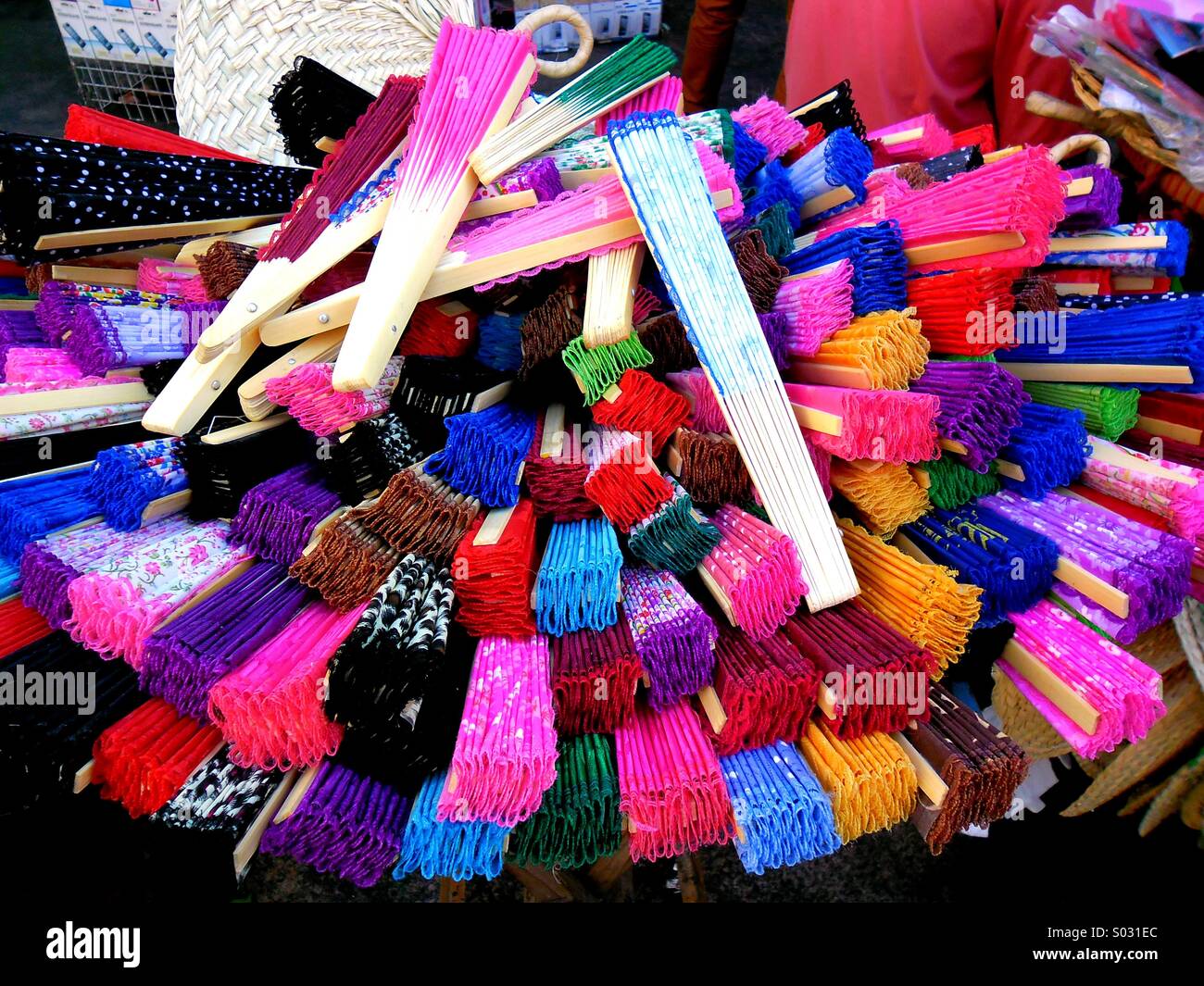 Colored fans sold in the streets of quiapo, Manila, Philippines in Asia ...