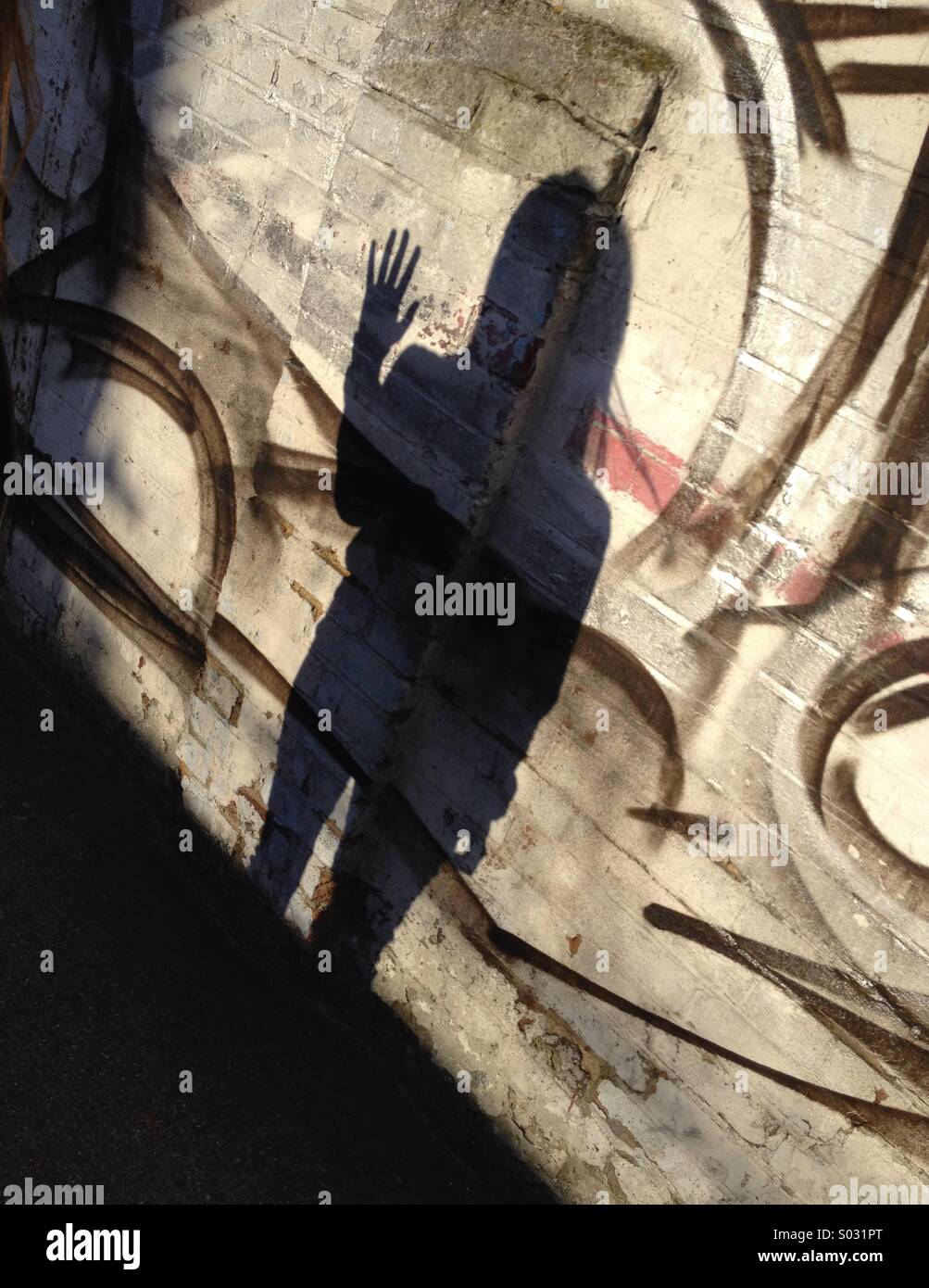 Shadow waving on wall Stock Photo - Alamy