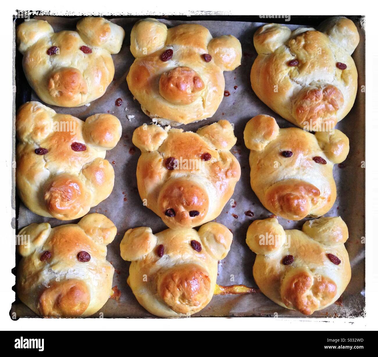 Baked sweet pigs Stock Photo - Alamy