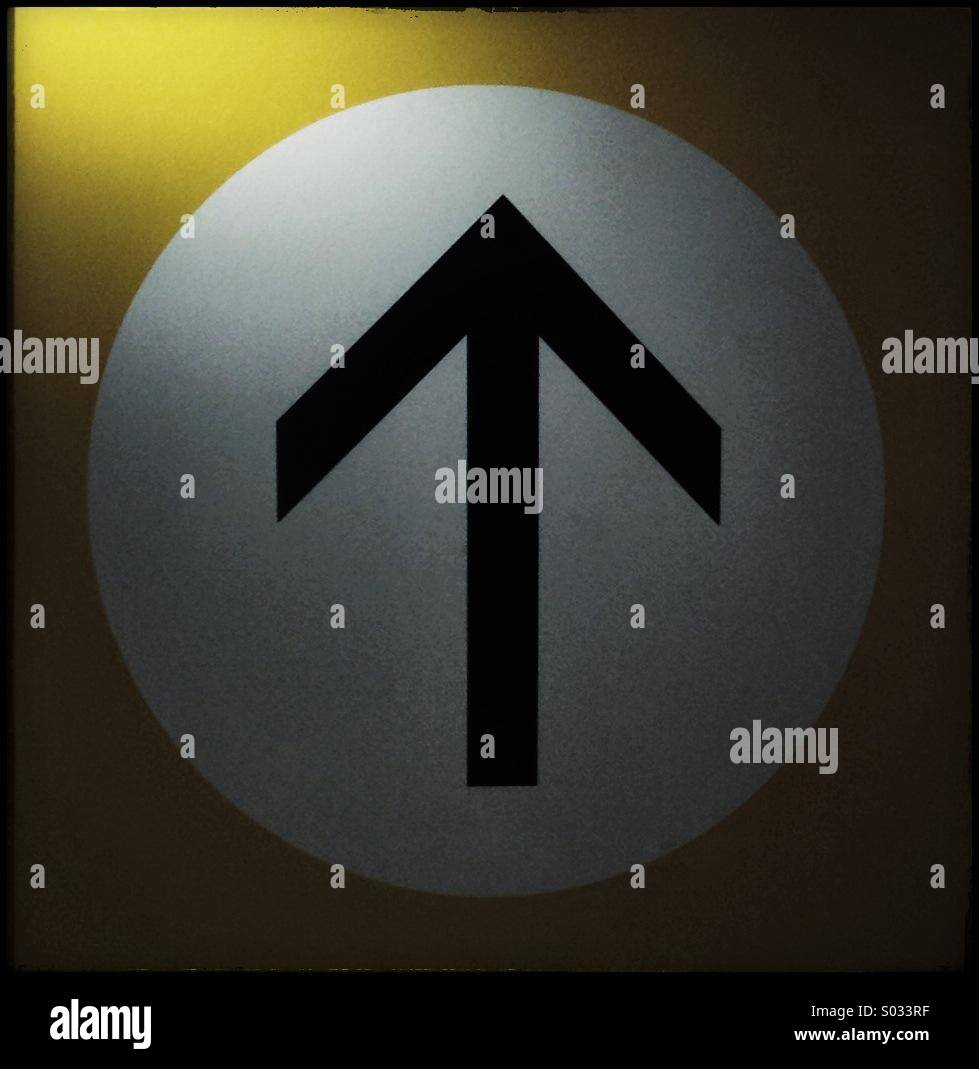 Arrow pointing upwards Stock Photo - Alamy