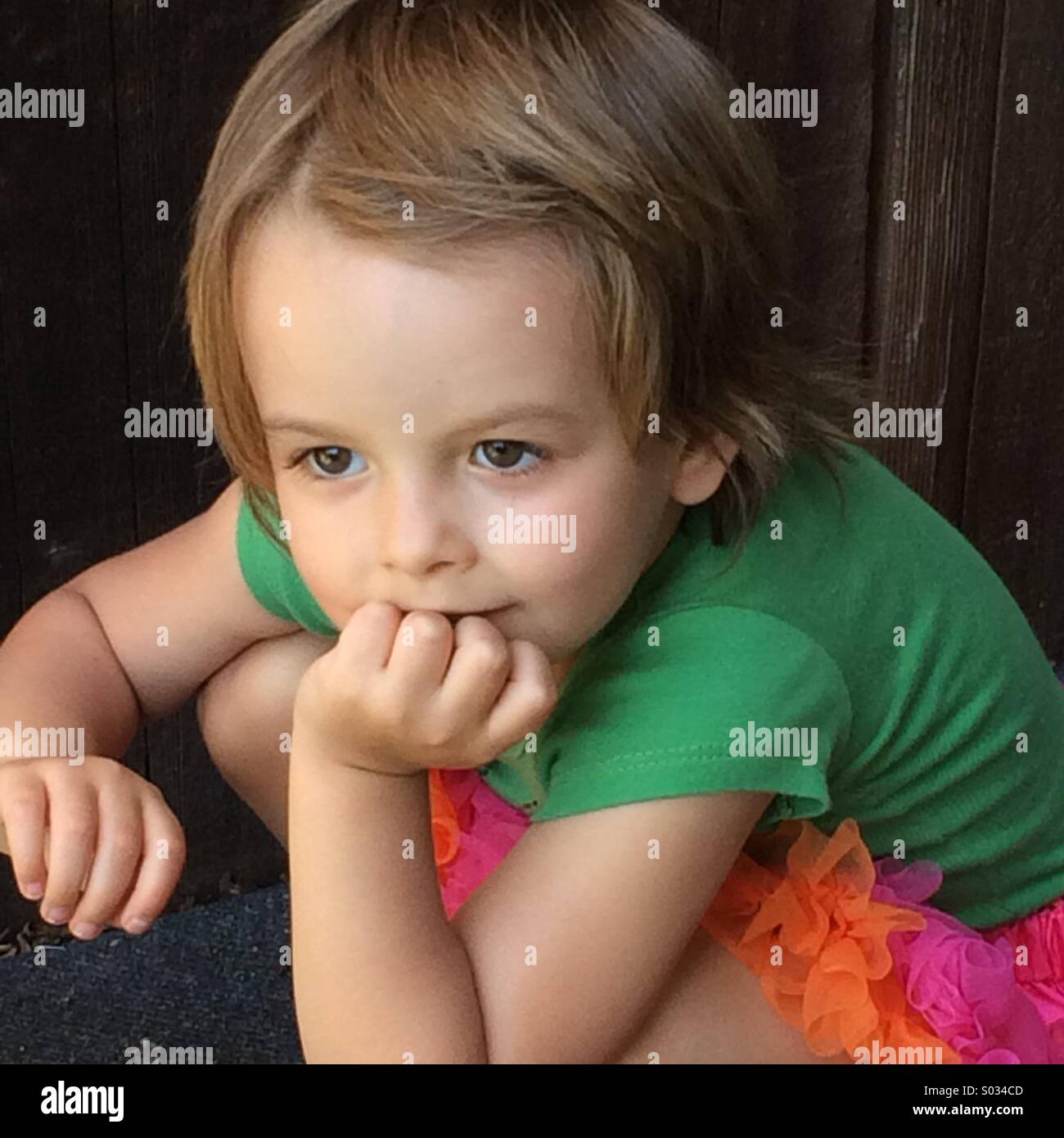 Little girl thinker Stock Photo - Alamy