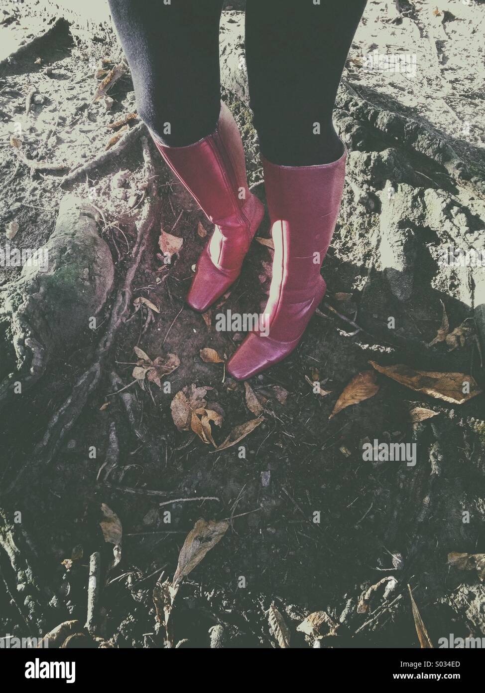 Red boots hi-res stock photography and images - Alamy