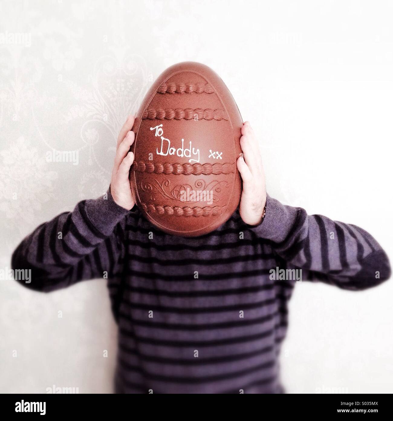 Daddy celebrating Easter with a chocolate Easter Egg present the size ...