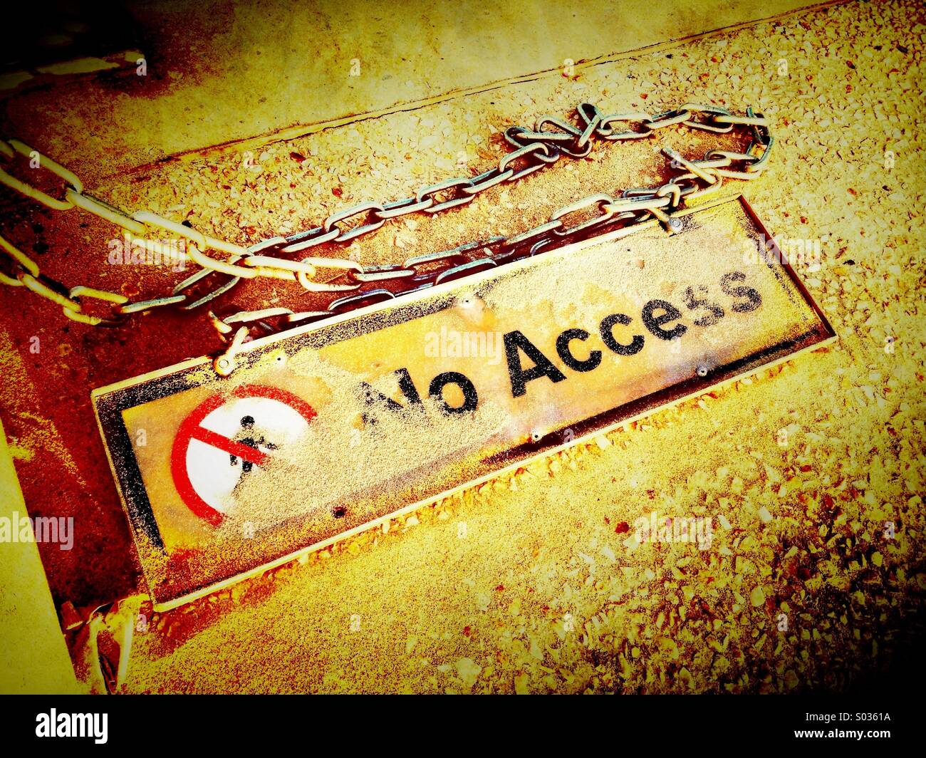 No Access sign covered in sand Stock Photo - Alamy