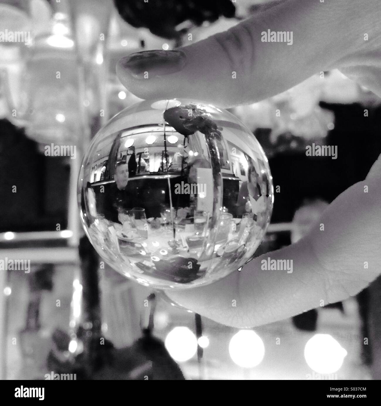 I've got the whole table between my thumb and finger Stock Photo - Alamy
