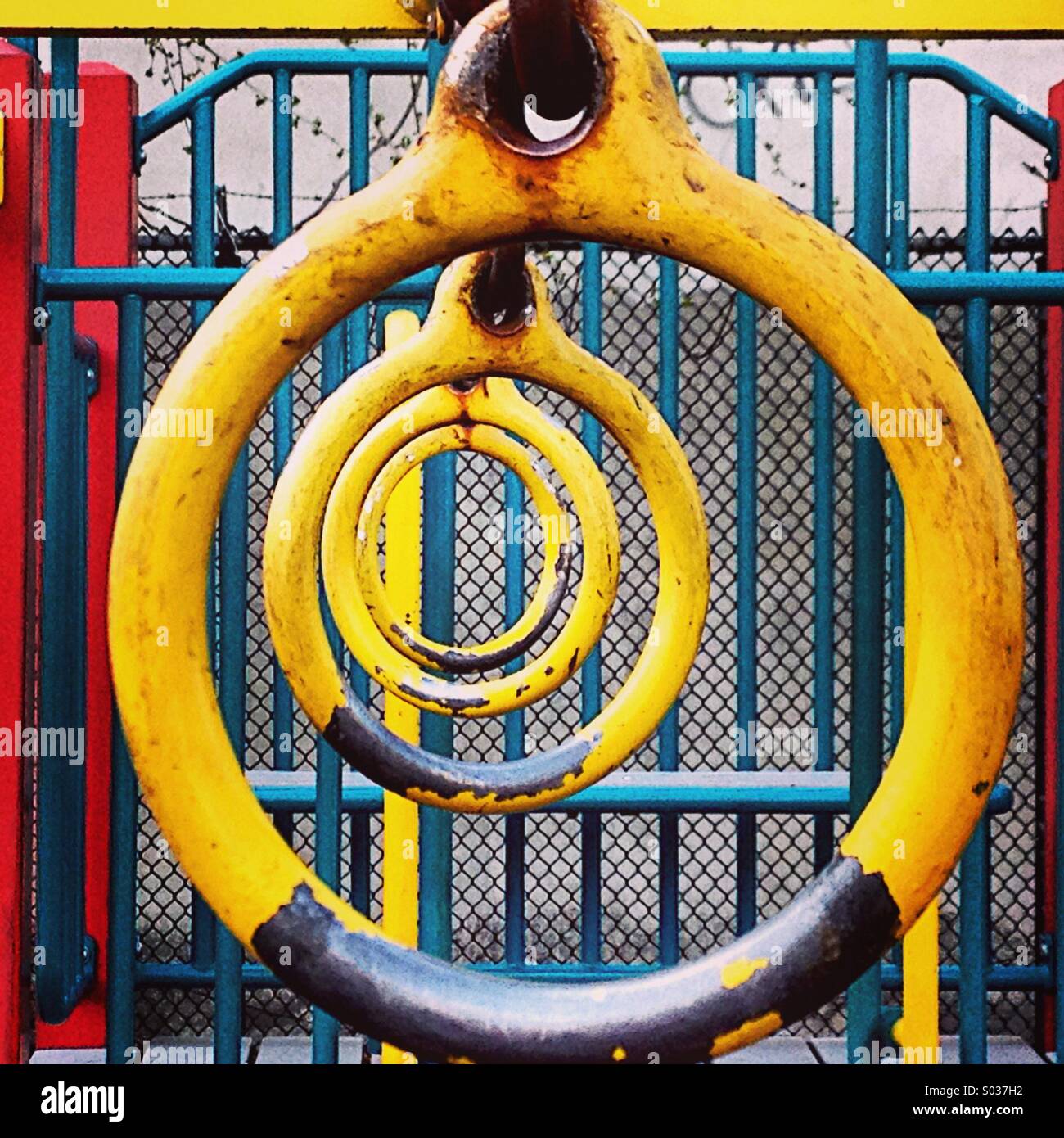 Multiple rings on a playground jungle gym Stock Photo - Alamy