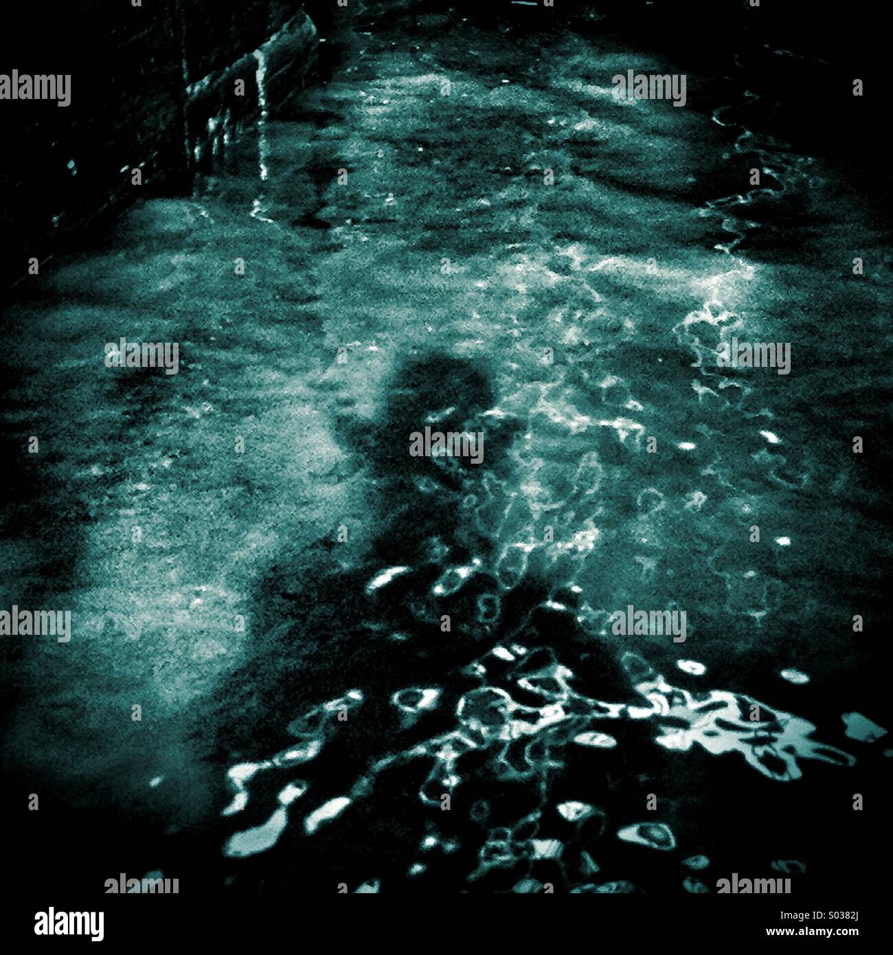 Shadow on water Stock Photo - Alamy