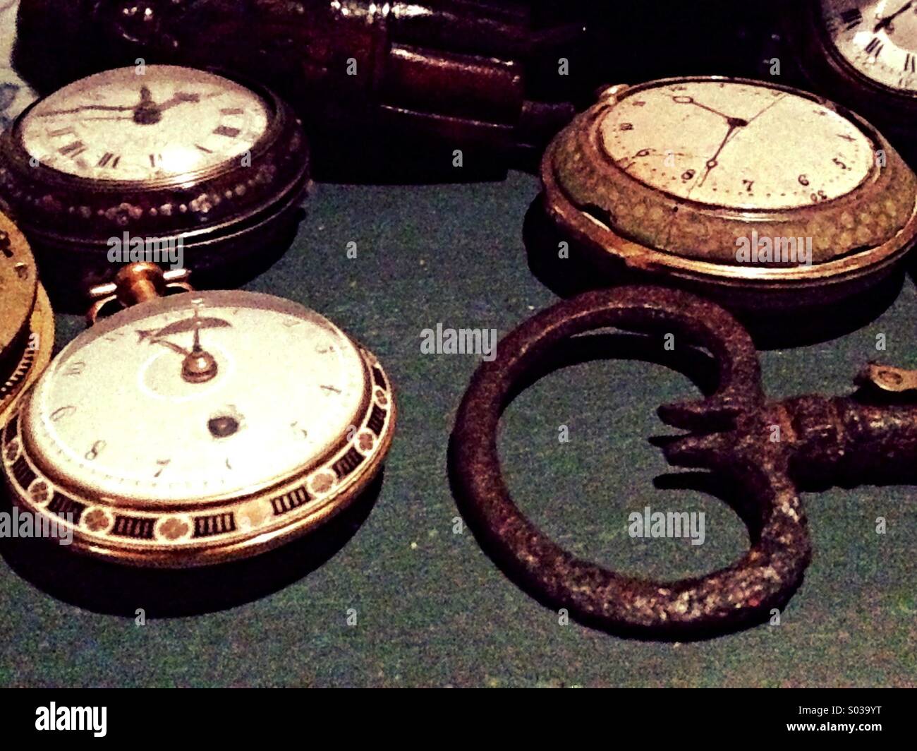 Pocket watches and keys Stock Photo - Alamy