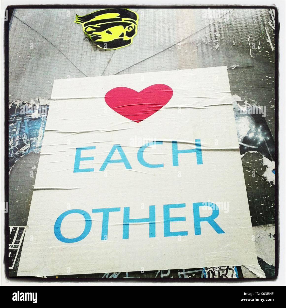 Love each other poster Stock Photo - Alamy