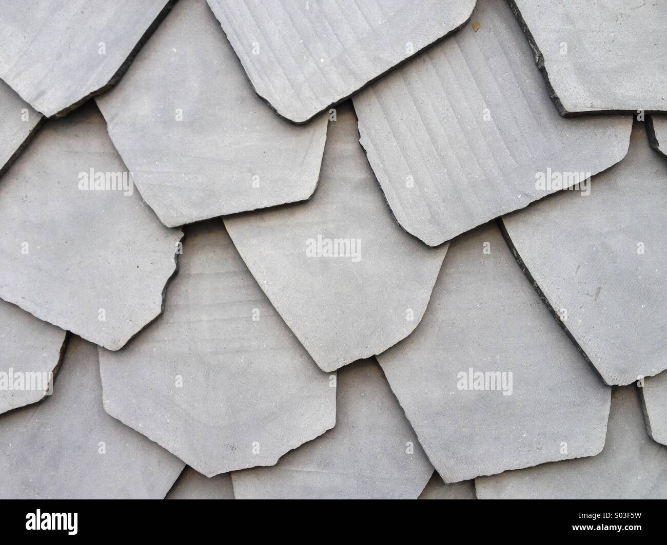 Gray stone wall tile Stock Photo - Alamy