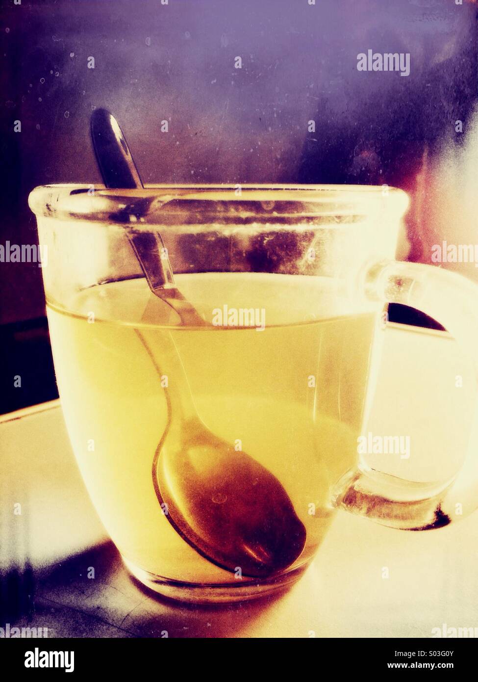 Cup of tea with spoon Stock Photo - Alamy