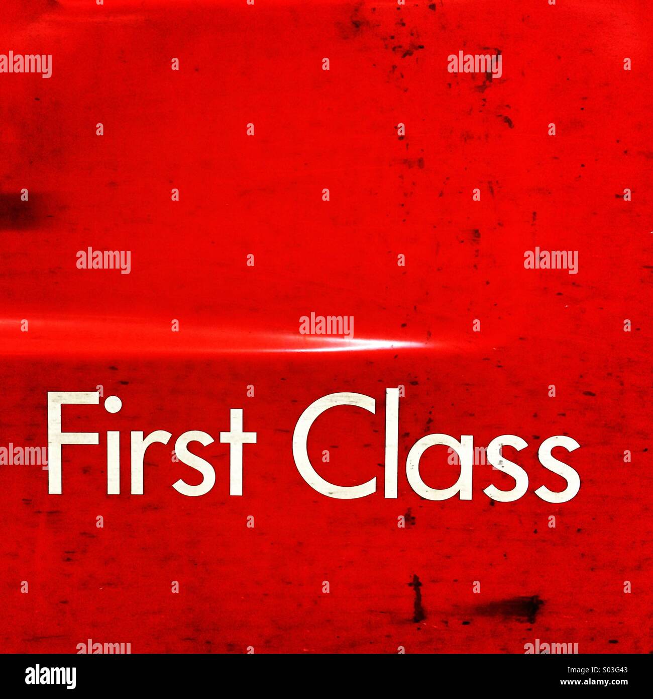 First Class carriage sign on a dirty red train door Stock Photo - Alamy