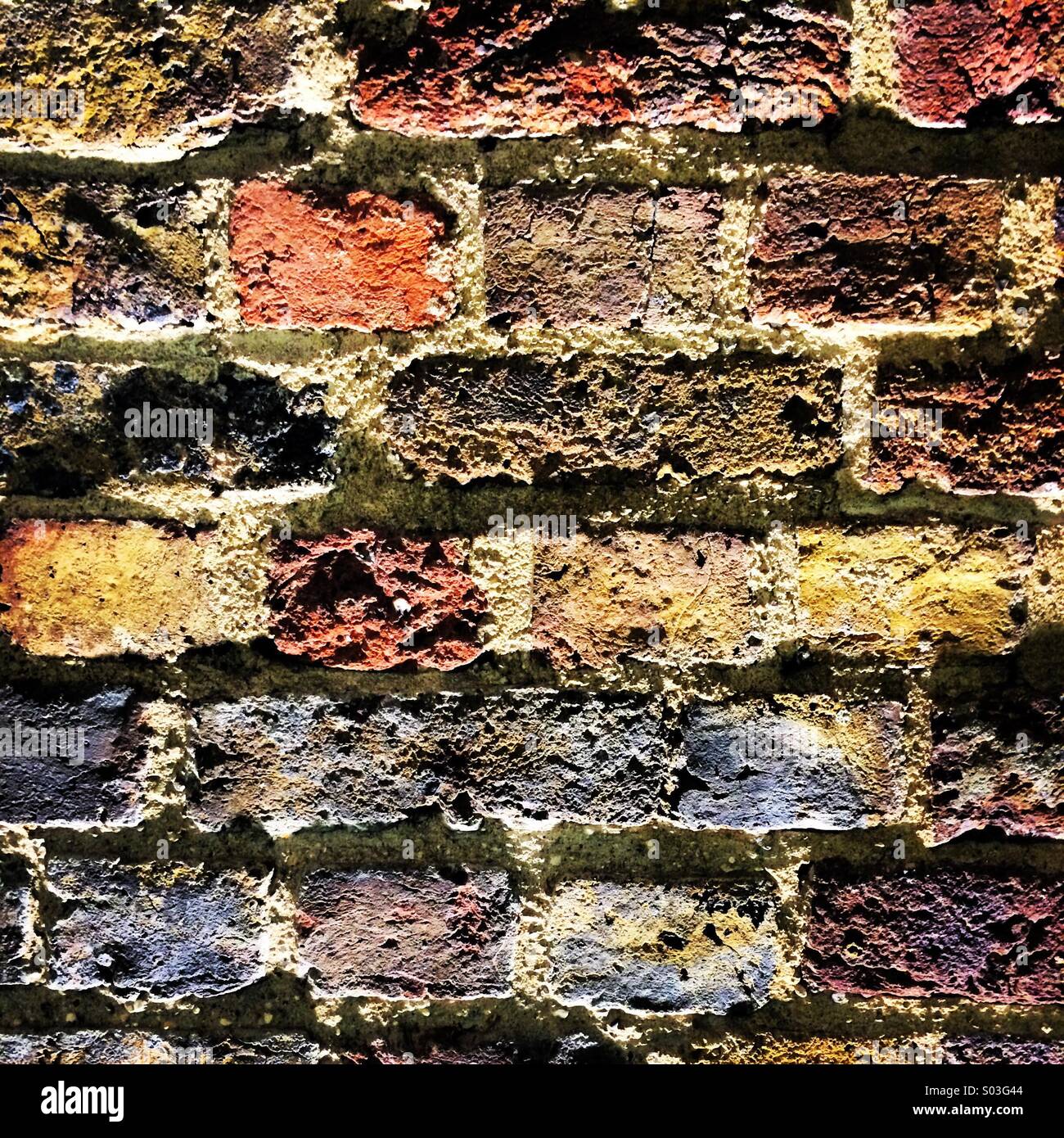 Varying shades of brick colours on a restored wall Stock Photo - Alamy