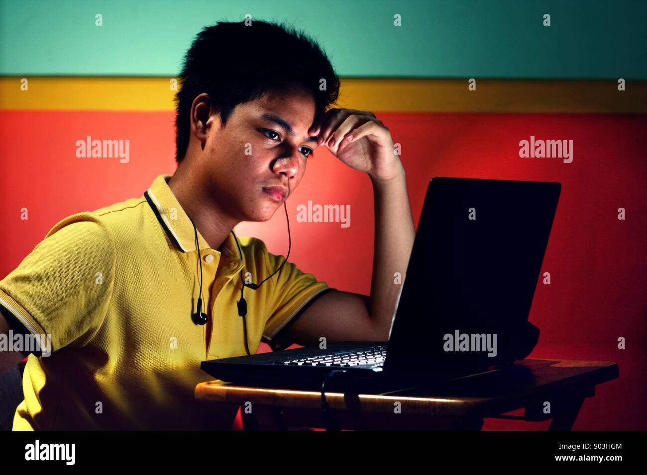 Asian teenager boy computer hi-res stock photography and images - Alamy