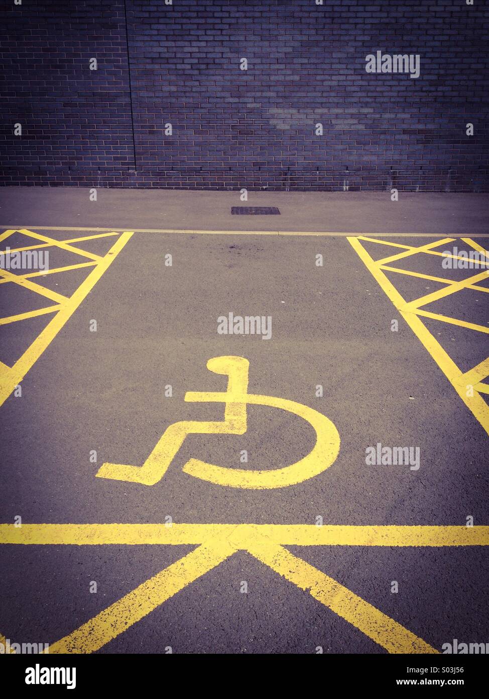 Disabled vehicle parking bay, England, UK Stock Photo - Alamy