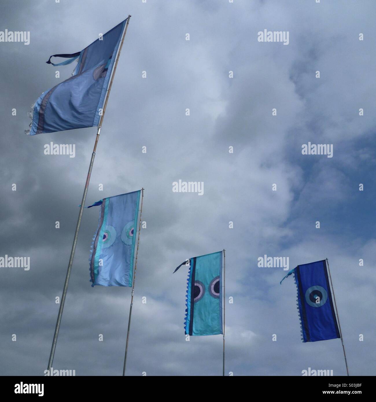 Blue festival flags Stock Photo - Alamy