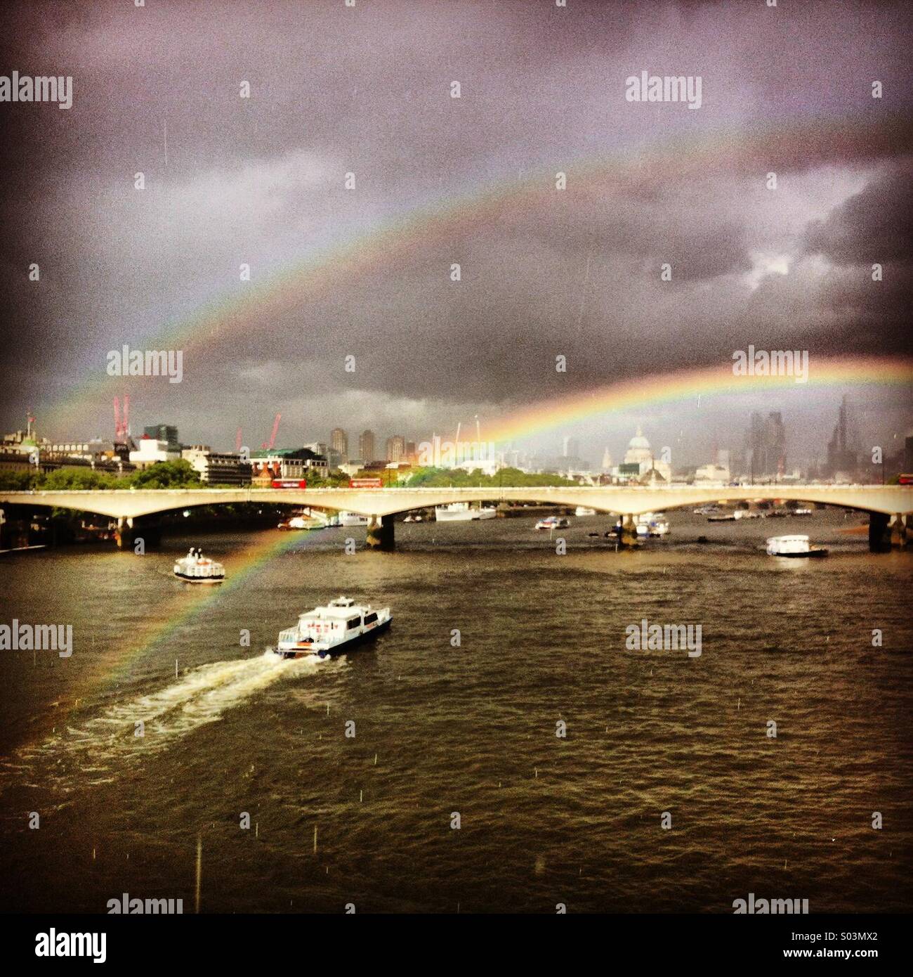 Rainbow over London Stock Photo - Alamy