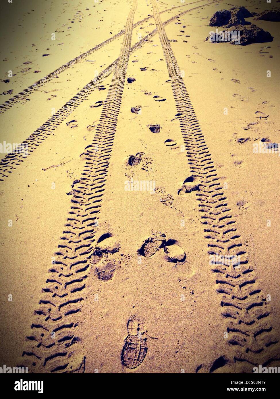 Wheel marks with footprints hi-res stock photography and images - Alamy