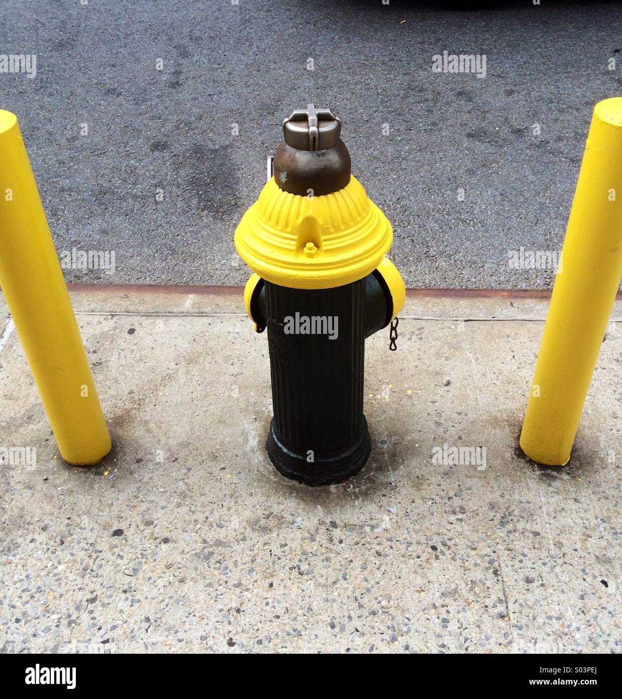 yellow hydrant in brooklyn Stock Photo - Alamy