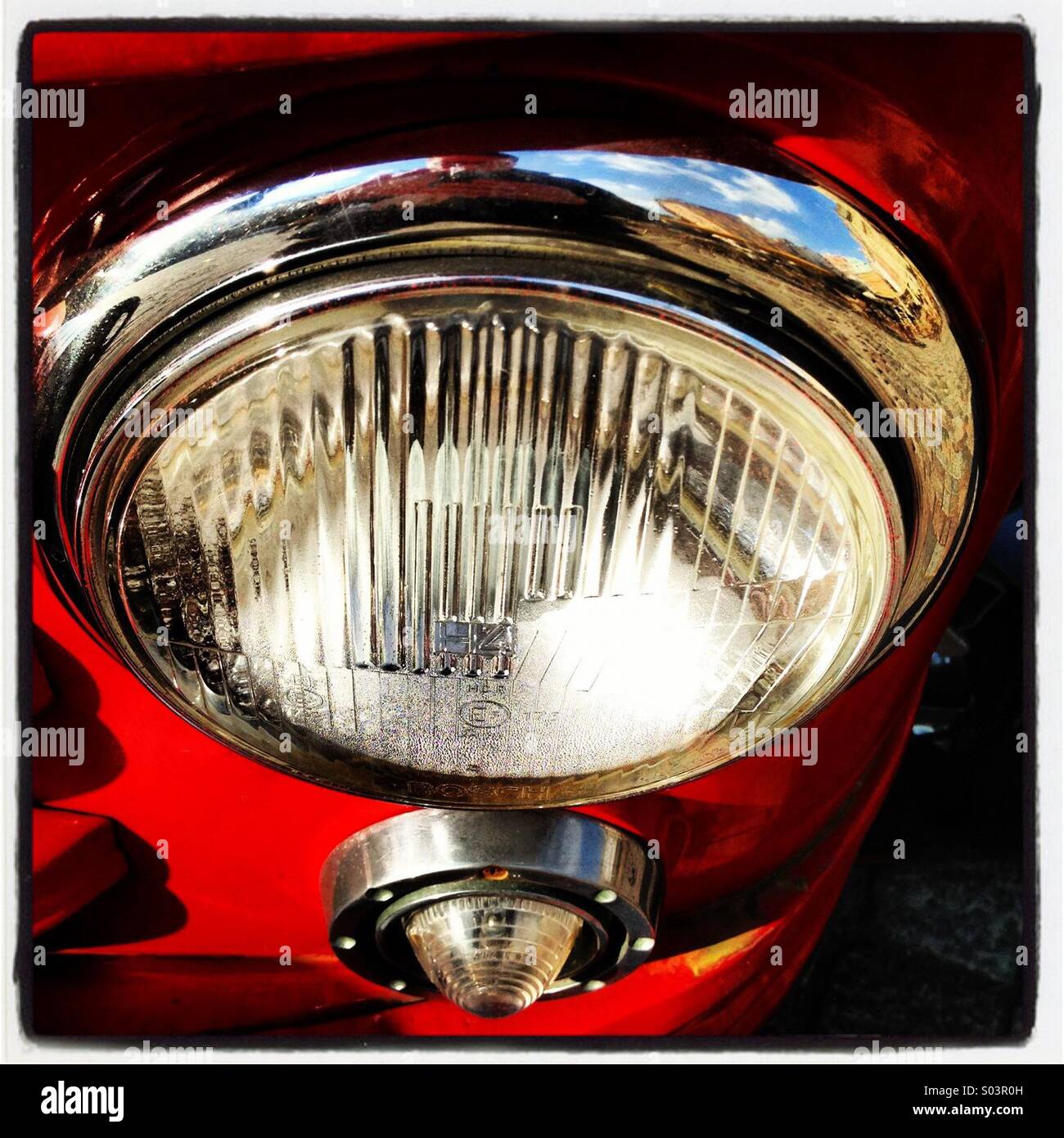 Headlight of red bus Stock Photo - Alamy
