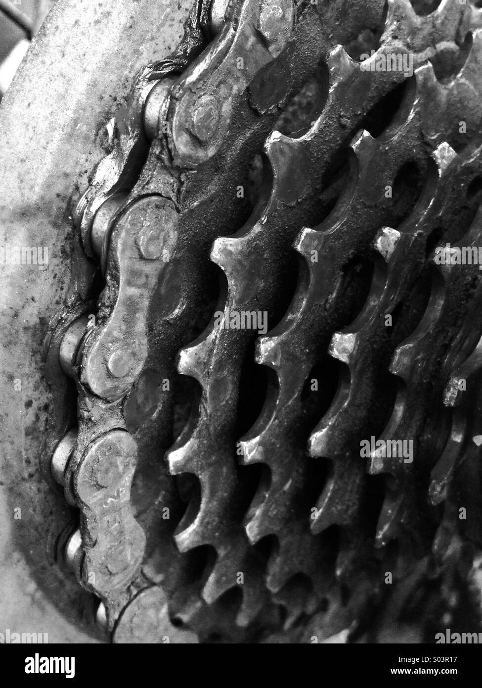 Chain on cog Black and White Stock Photos & Images - Alamy