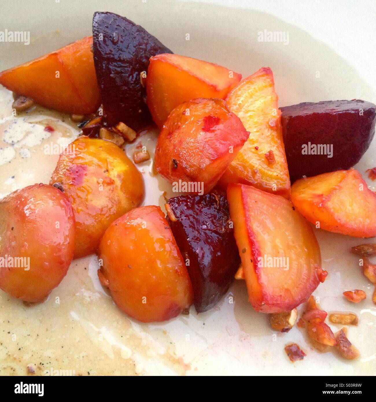 Orange and red beet salad Stock Photo - Alamy